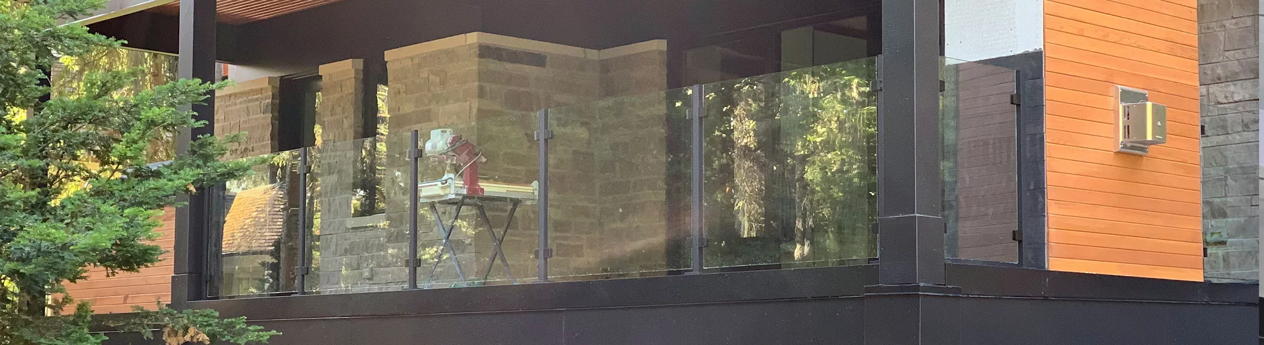 Glass vs. Traditional Railings for Decks and Balconies