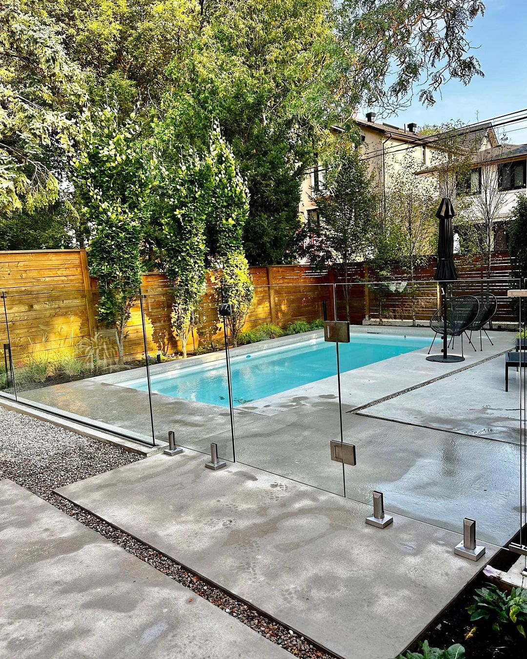 Enhancing Your Pool and Backyard with Glass Railings